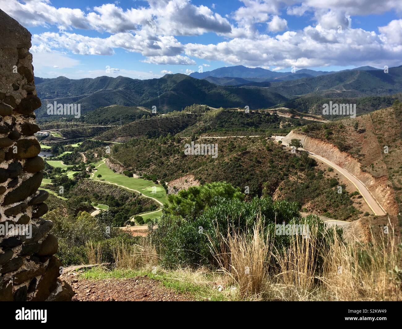 Valley between Spanish mountains Stock Photo - Alamy