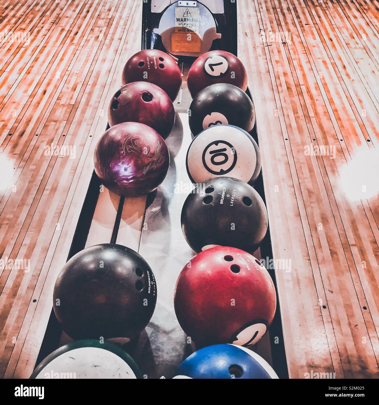 Too many bowling balls Stock Photo - Alamy
