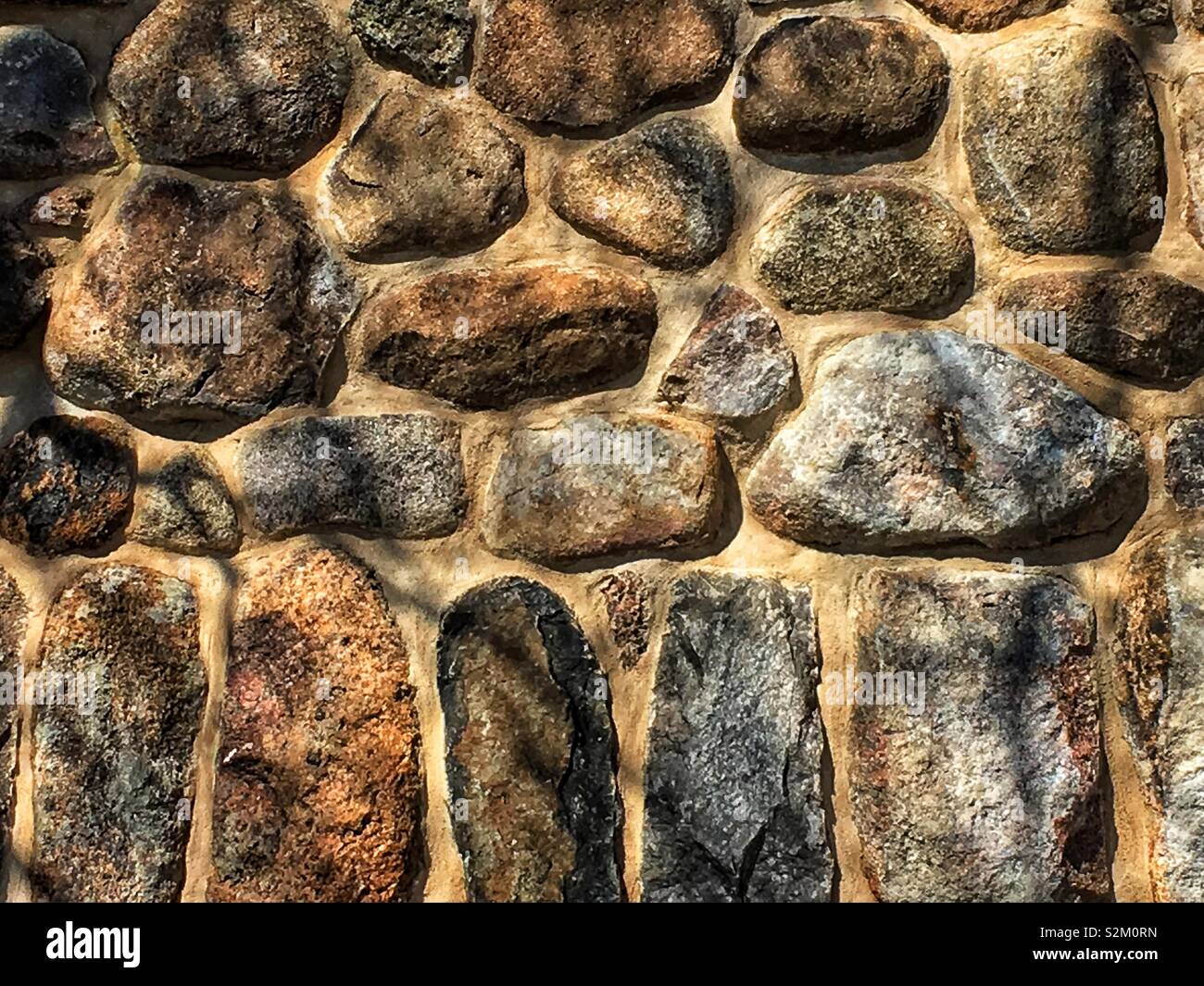 Old cobblestone wall Stock Photo - Alamy