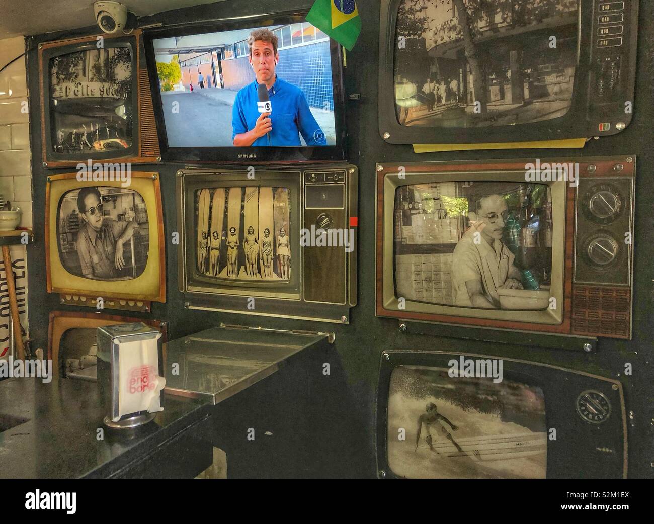 A contrast between old and modern technology - TV sets Stock Photo - Alamy