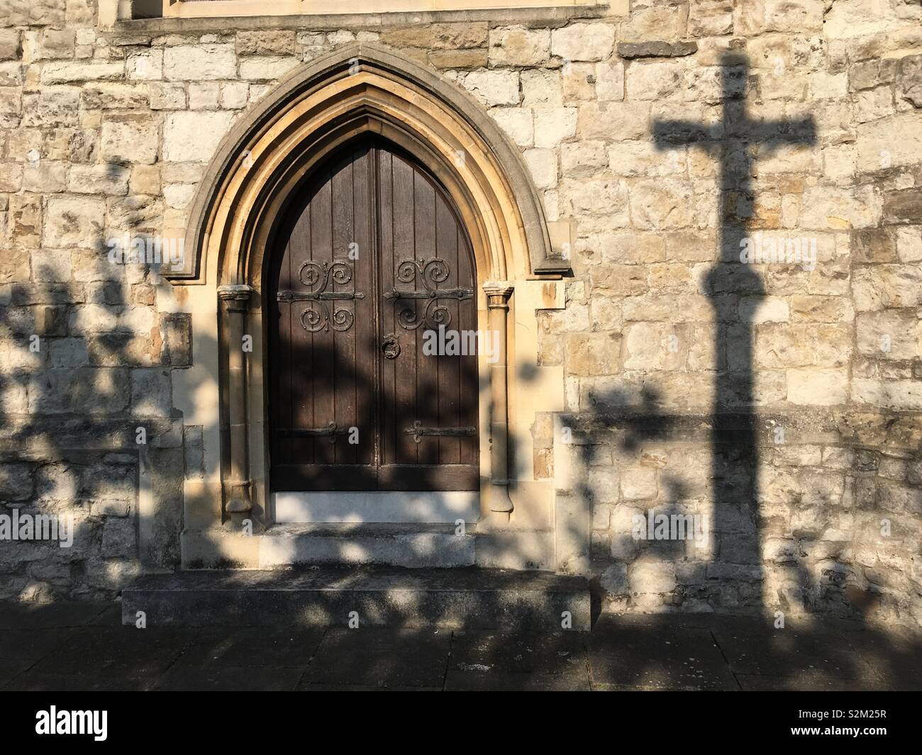 Religious cross and shadow hi-res stock photography and images - Alamy