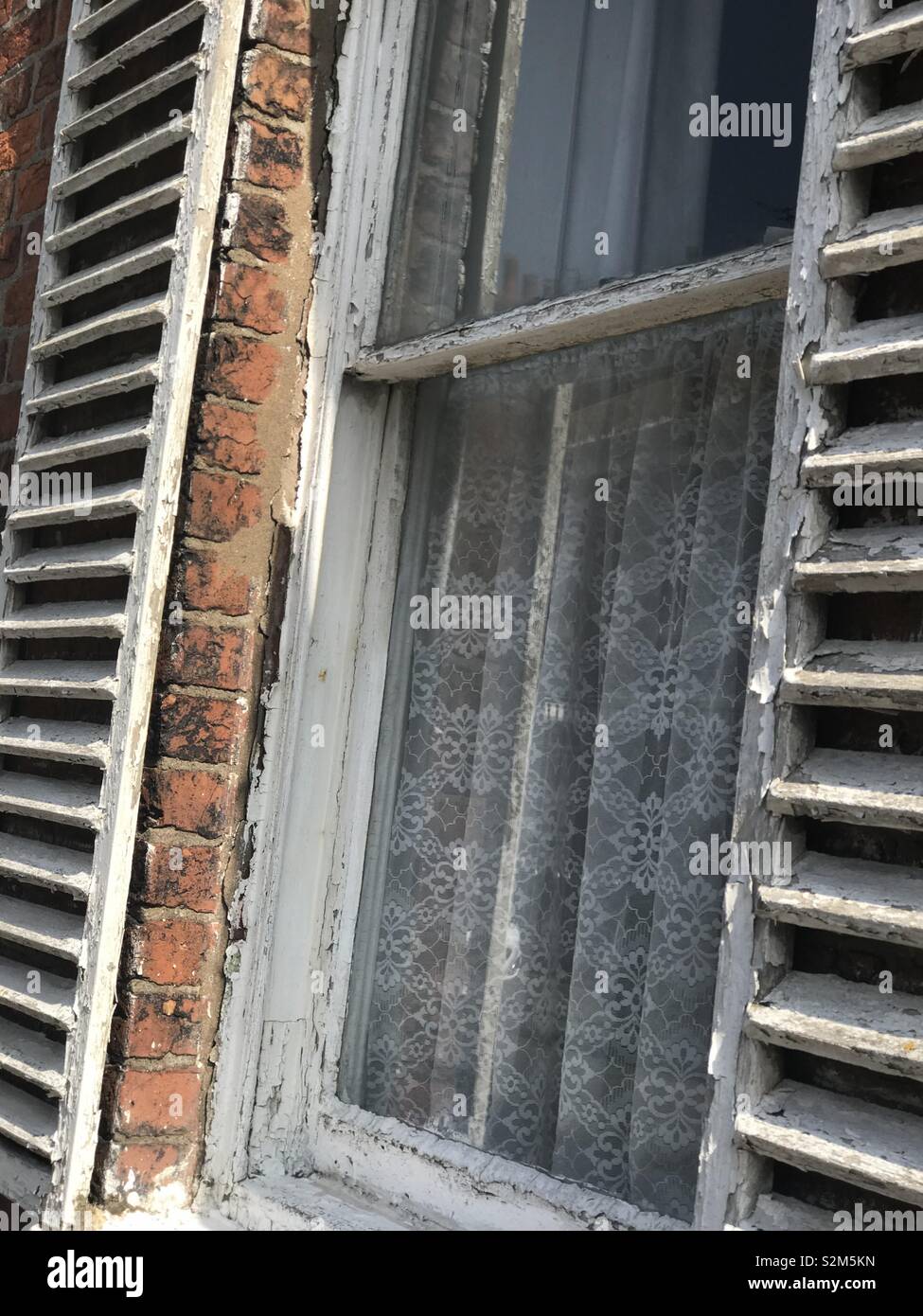 Old worn down windows Stock Photo - Alamy