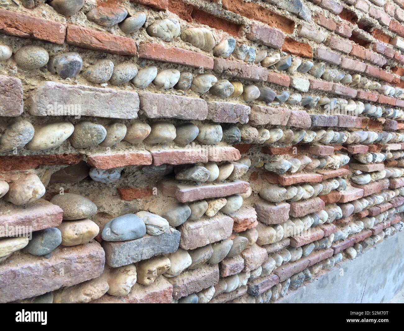 Worn mortar in French village walls Stock Photo - Alamy