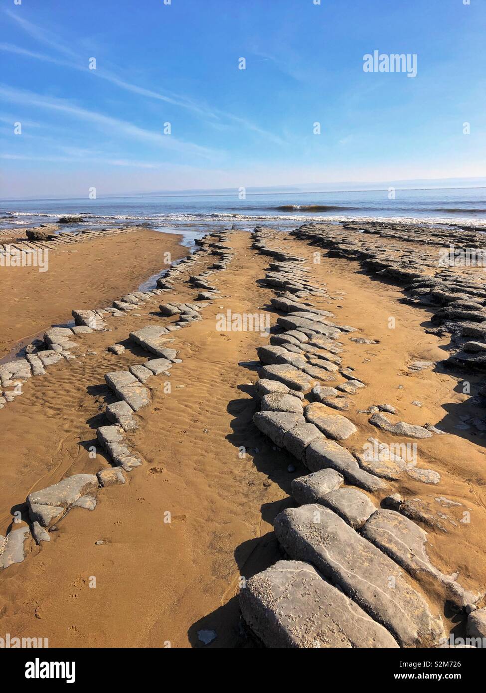 Rock formations and patterns on a Welsh beach Stock Photo - Alamy