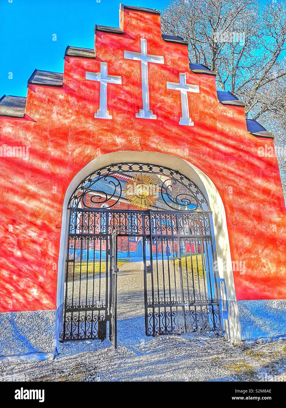 Three crosses above gateway to Strängnäs Cathedral, Sodermanland County ...
