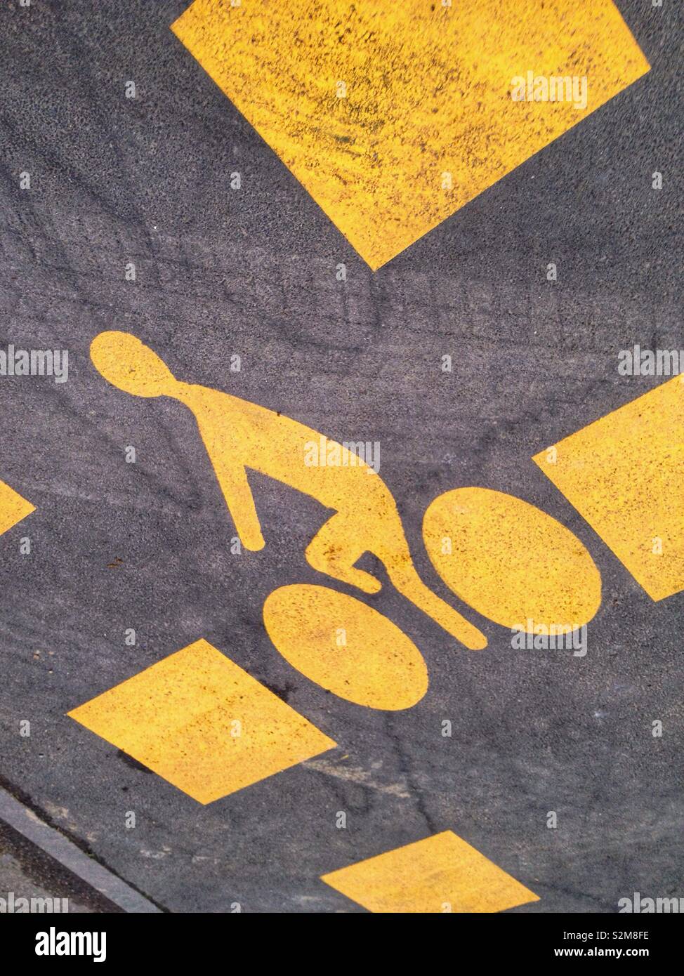 Pictogram on the ground in a street Stock Photo - Alamy