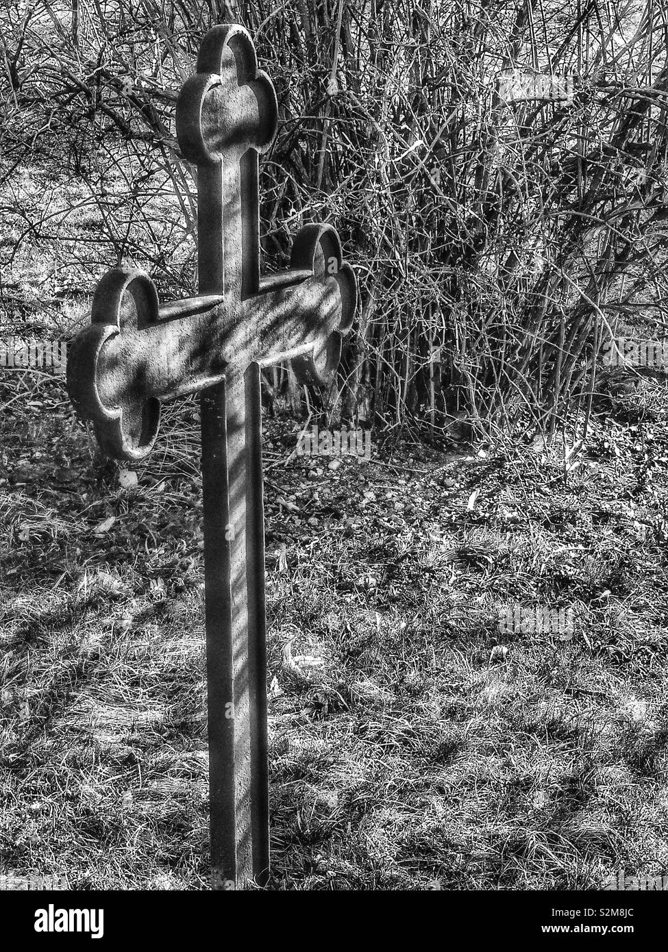 Black and white image of cross with sunlight and shadows, Sweden ...