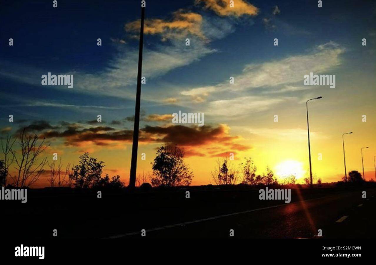 Beautiful sunrise entire to work Stock Photo - Alamy
