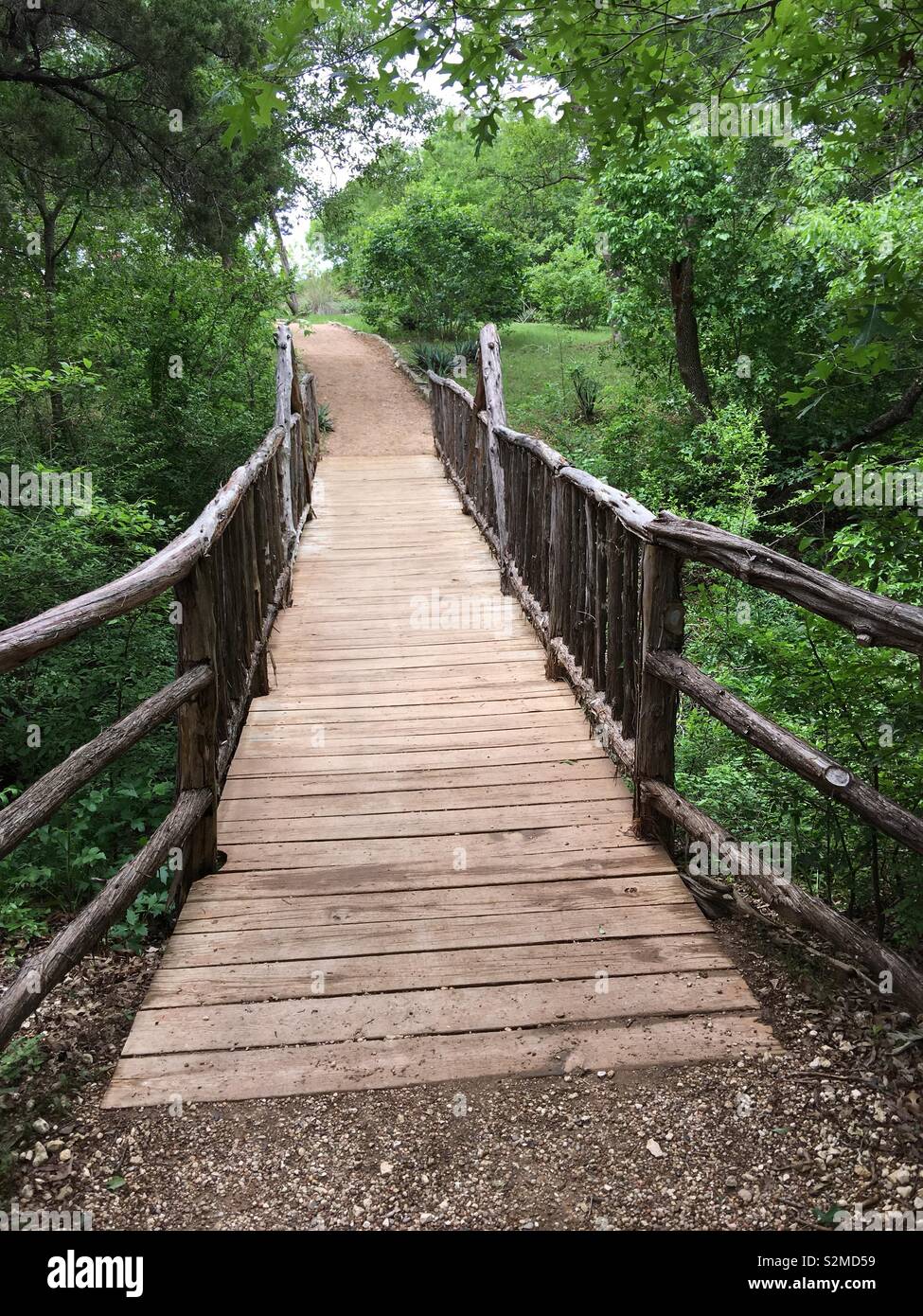 Rustic wooden bridge hi-res stock photography and images - Alamy