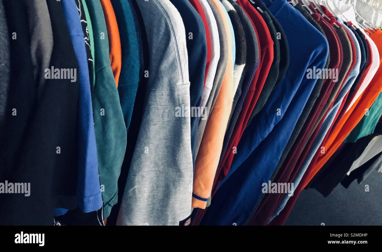 Colorful textiles of cloth ready for purchase to wear Stock Photo - Alamy