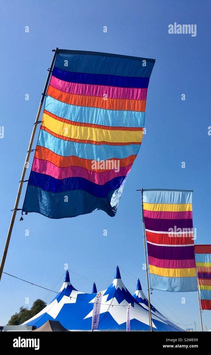 Colorful Flags in a Front of a Big Top Stock Photo - Alamy