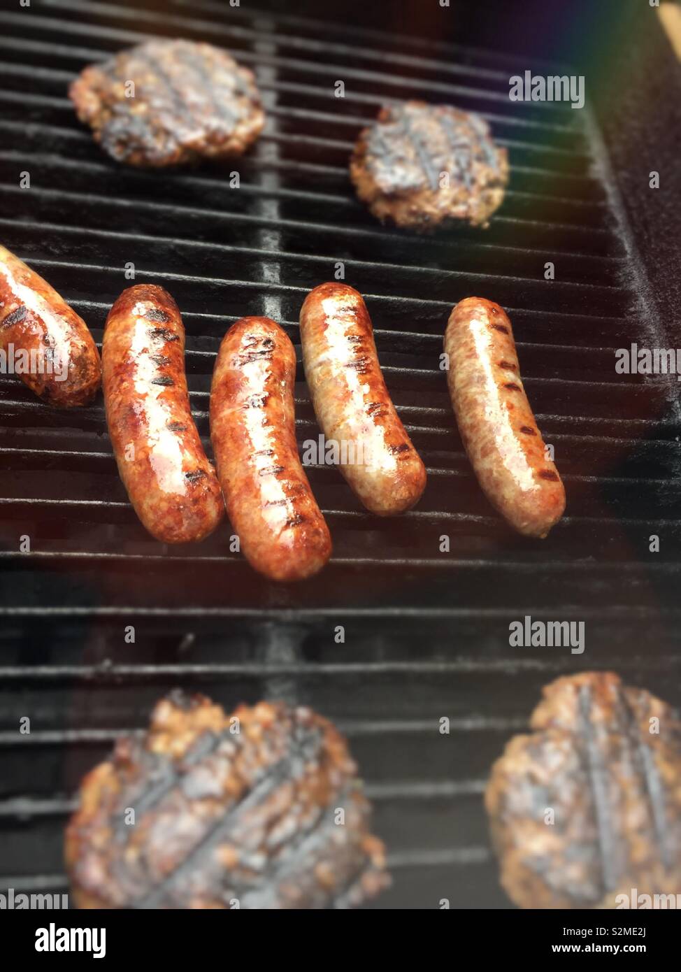 Hamburgers and brought worst cooking on an outdoor grill, USA Stock ...