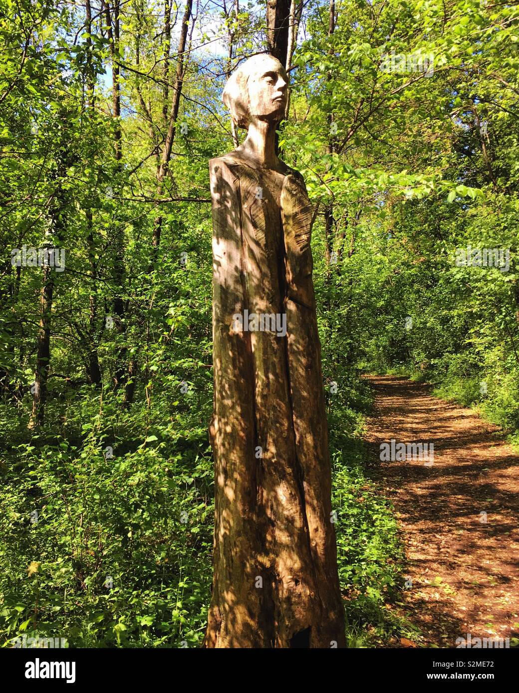Statue in the woods Stock Photo - Alamy