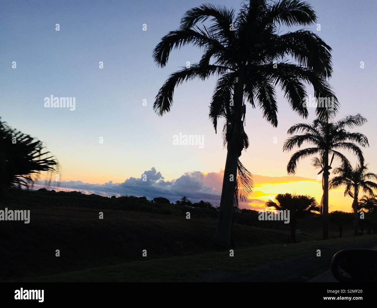 Tropical sunsets hi-res stock photography and images - Alamy