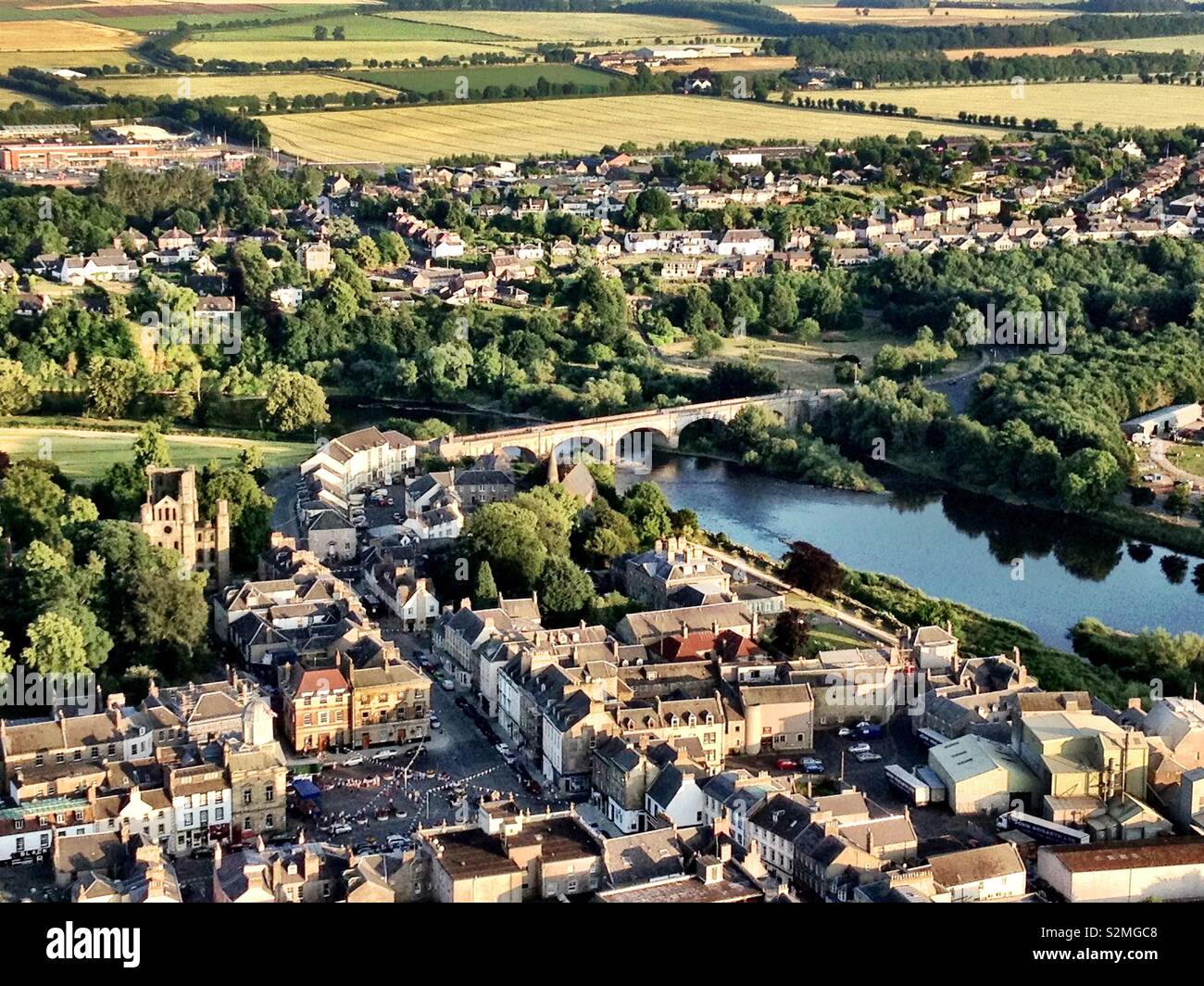 Aerial view over Kelso, Scottish Borders, Scotland, UK with bridge over ...