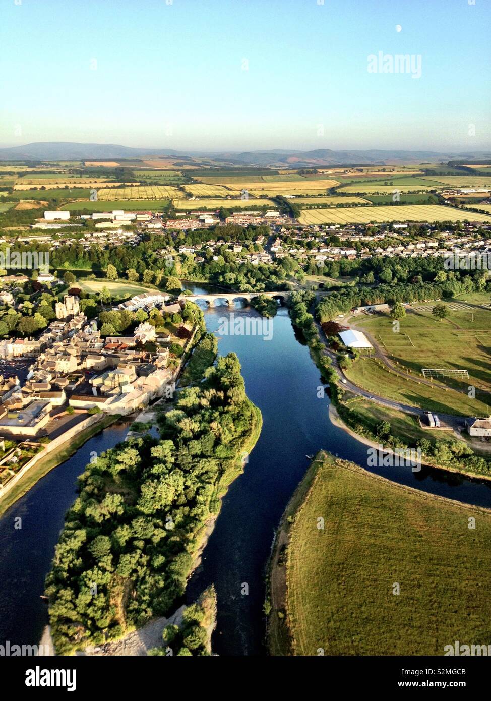 Aerial view over Kelso, Scottish Borders, Scotland, UK with bridge over ...