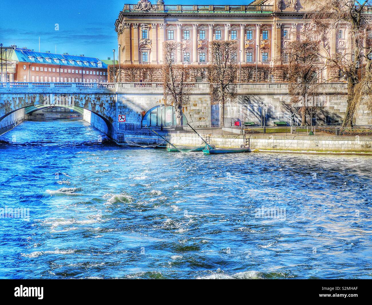 Norrbro arch Bridge across Norrstrom and in front of the Riksdagshuset ...