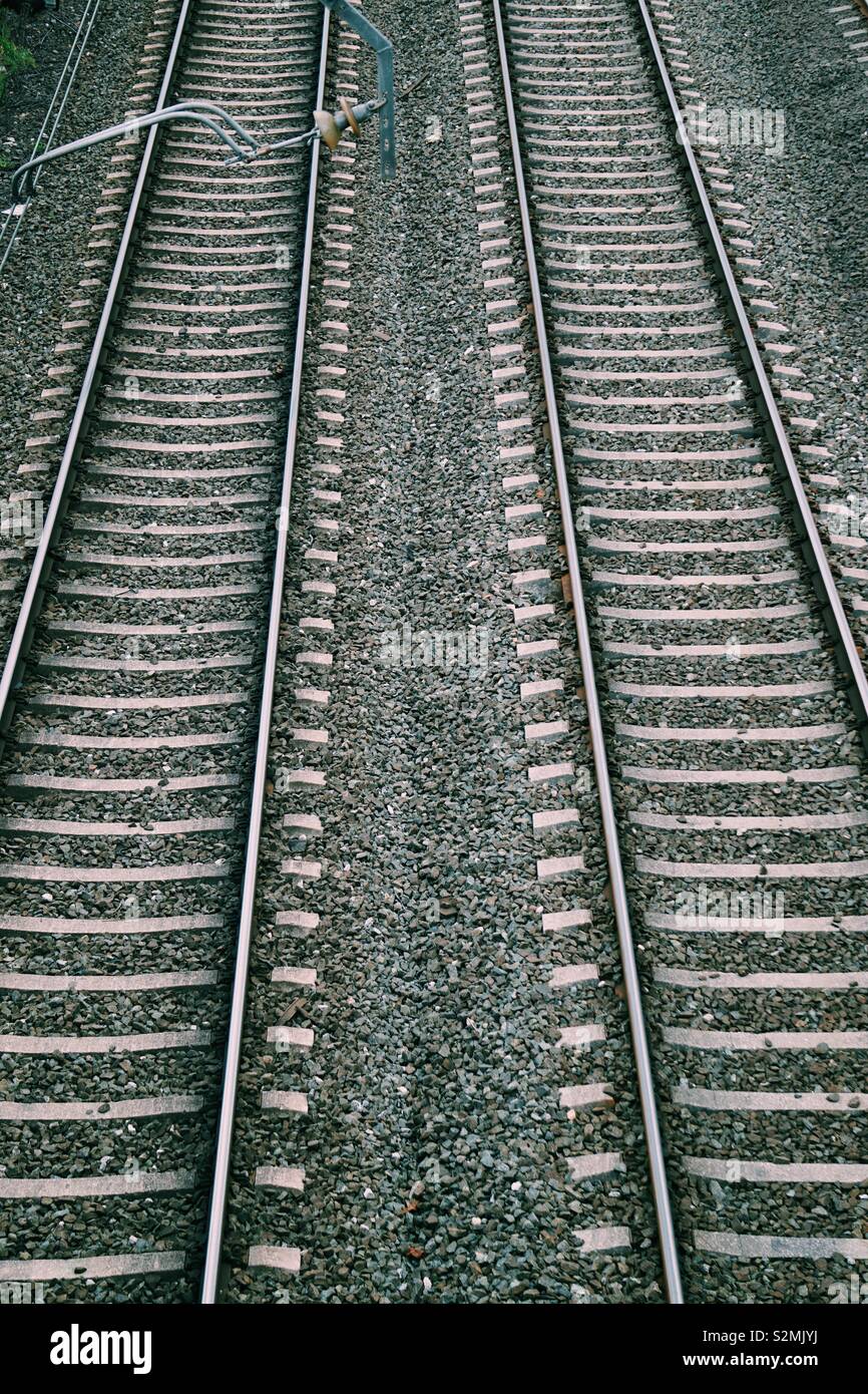 train tracks in the station in the street Stock Photo - Alamy