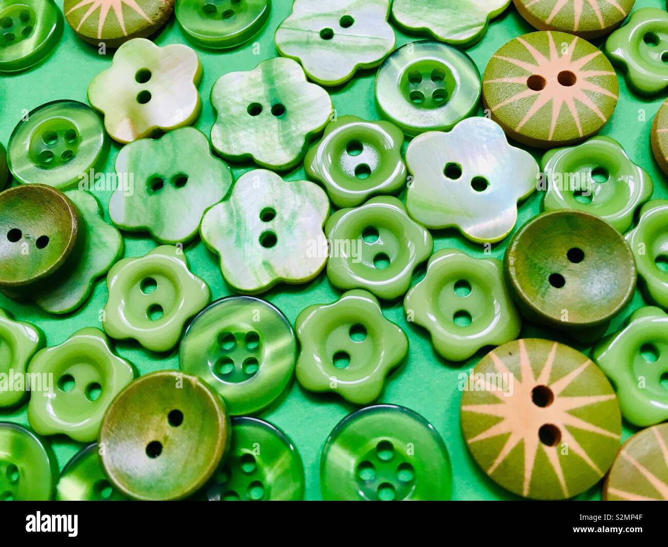Assortment of colourful green buttons Stock Photo - Alamy