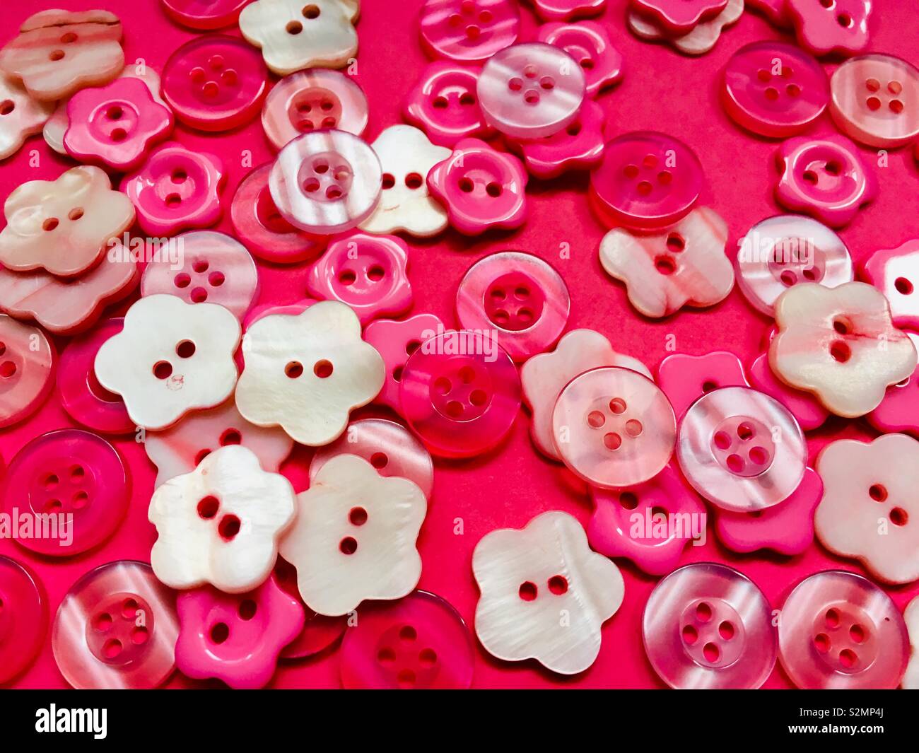 Assortment of colourful pink buttons Stock Photo - Alamy