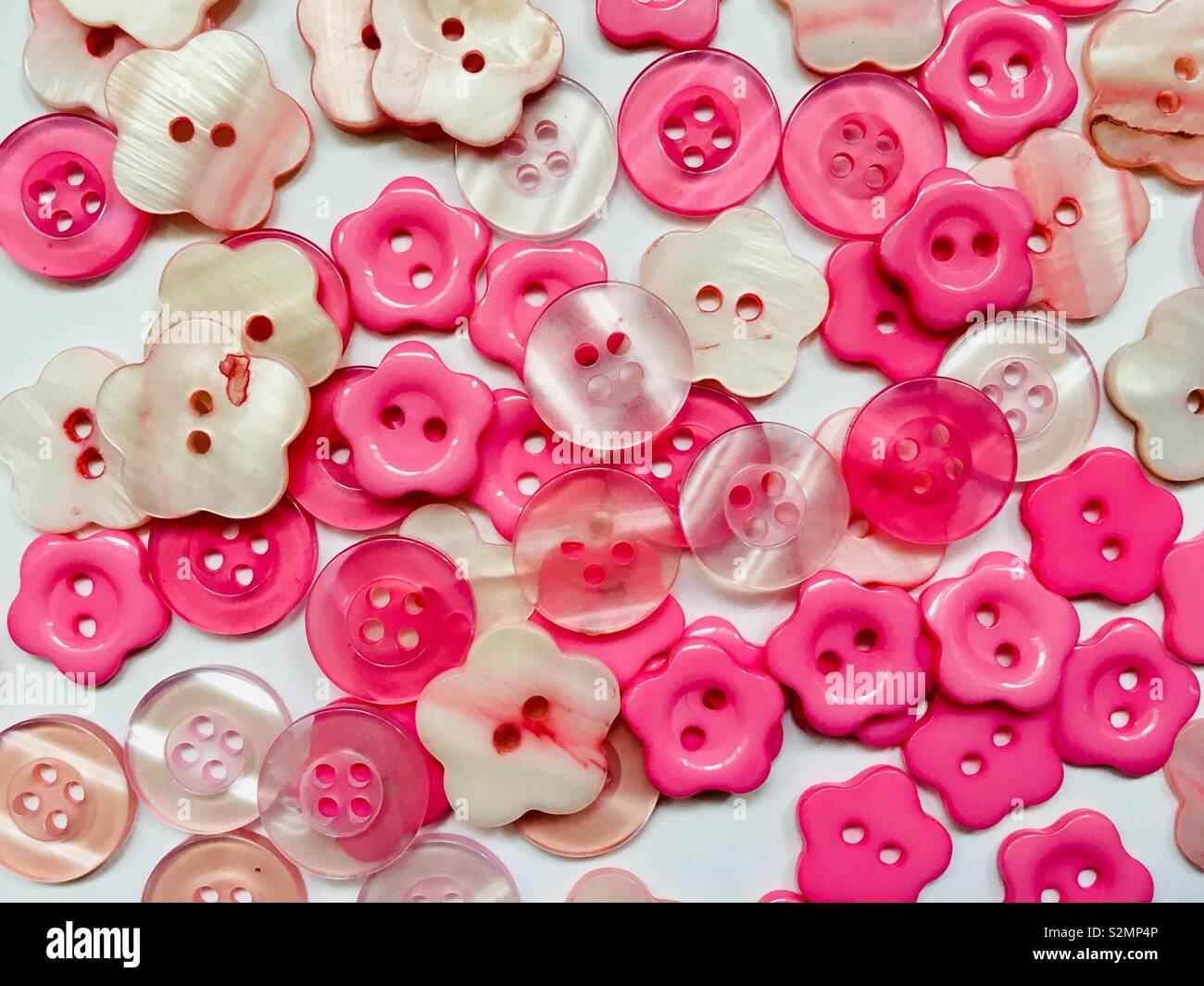Pink buttons hi-res stock photography and images - Alamy