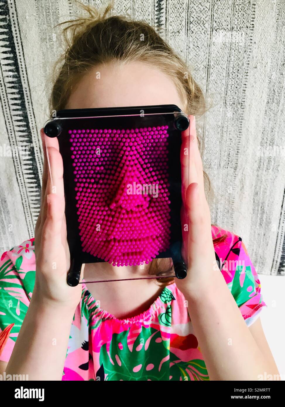 Girl with pinart on face Stock Photo - Alamy