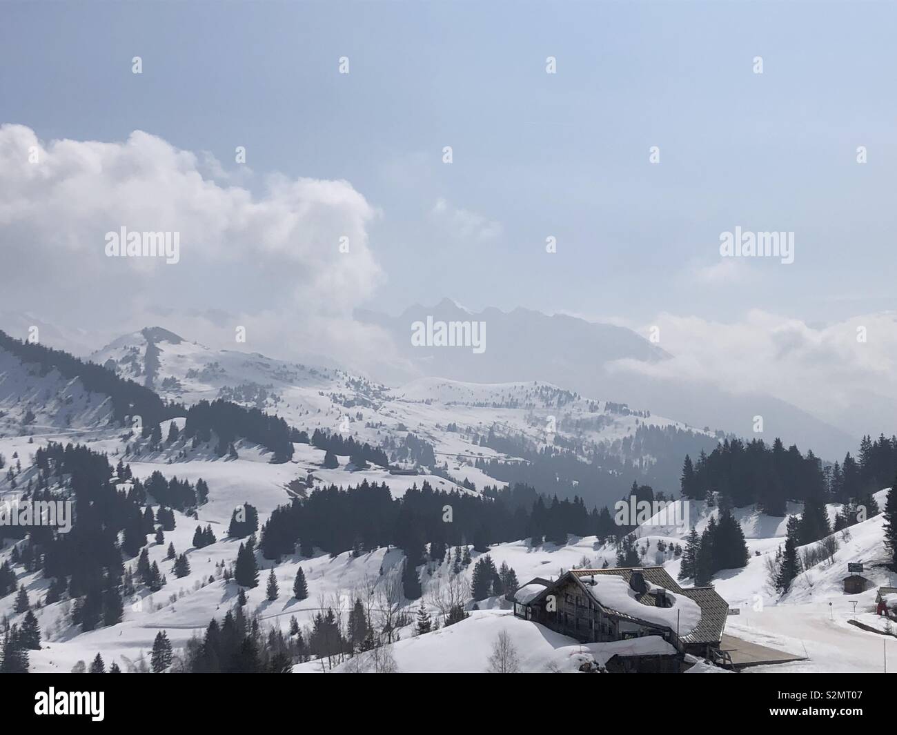 Mountains in snow and sunshine Stock Photo - Alamy