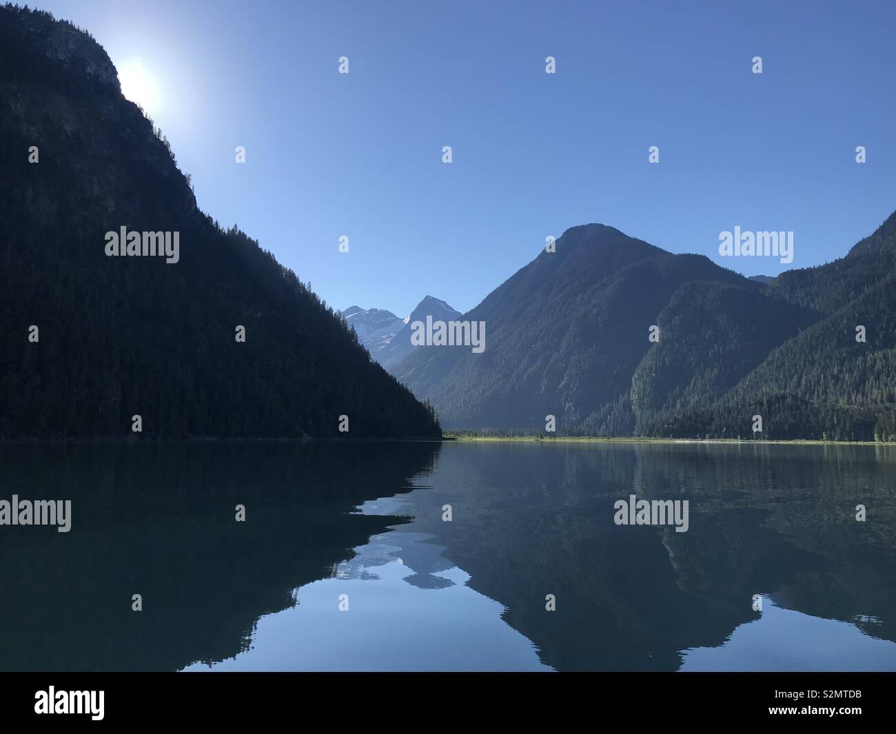 Sunny day on Mud Lake in Blue River, BC, Canada Stock Photo - Alamy