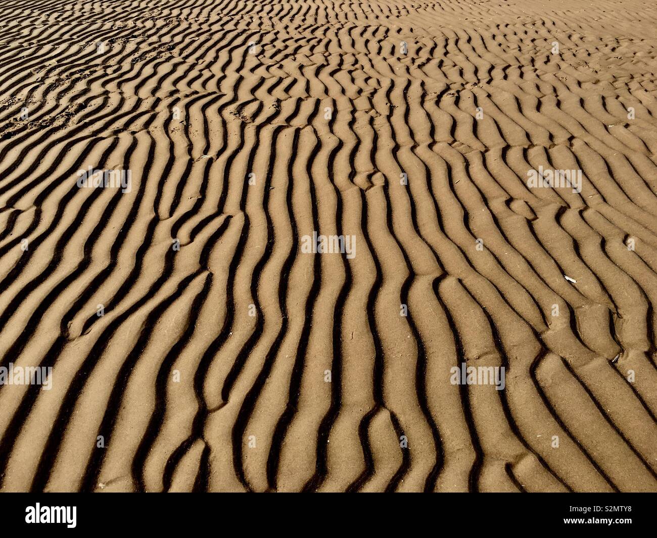 Ripples in the sand Stock Photo - Alamy