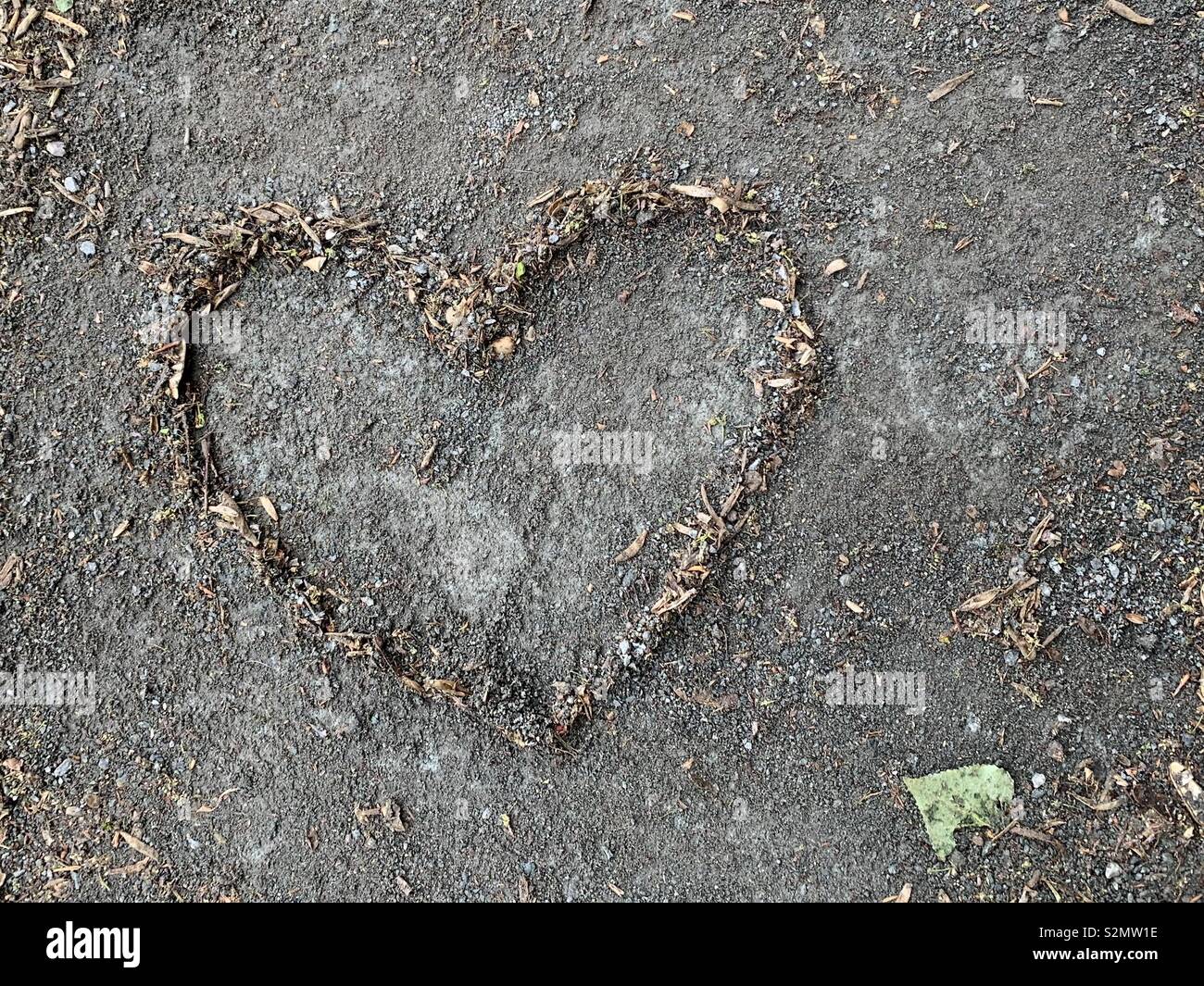 Heart on path Stock Photo - Alamy