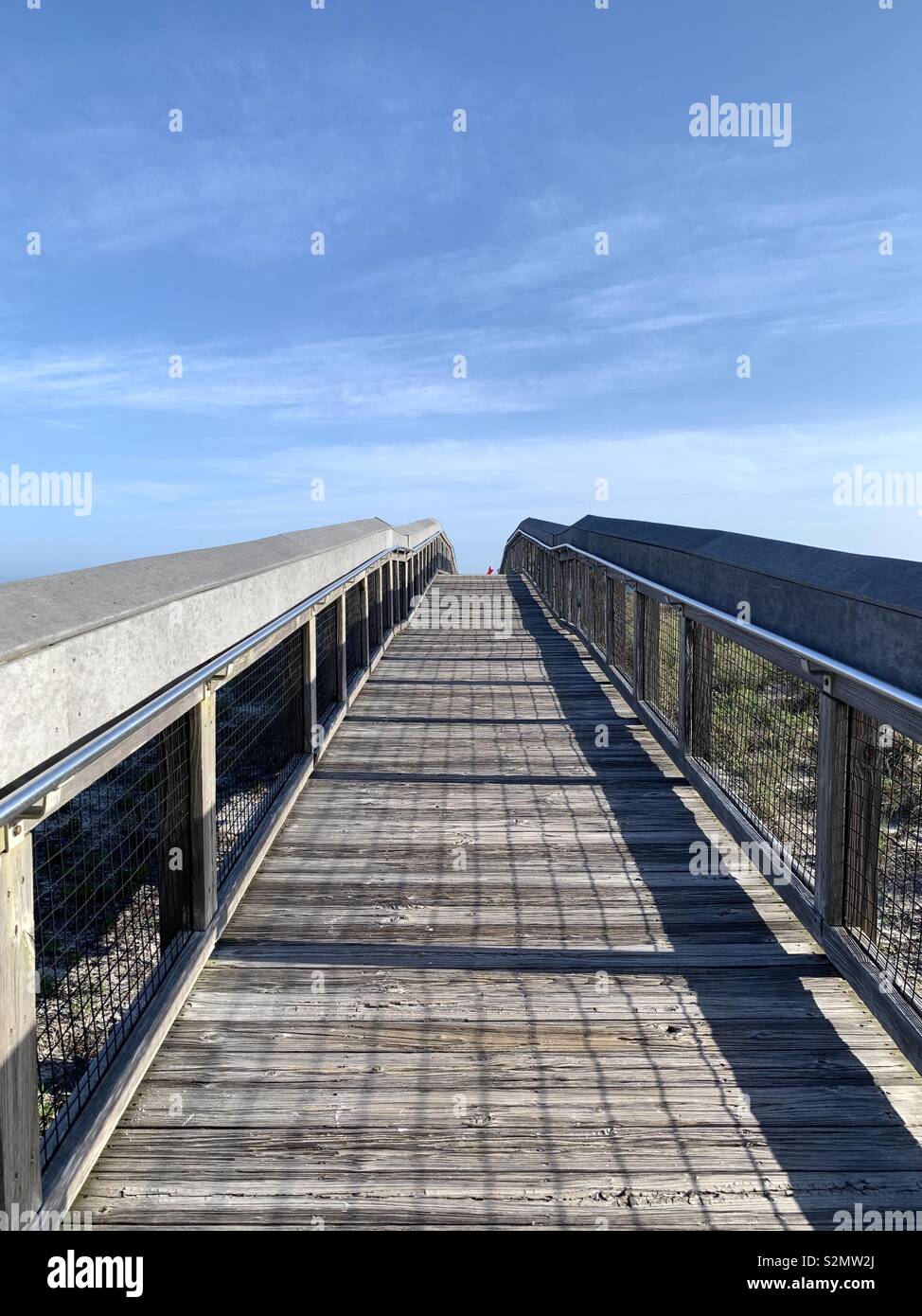 Bridge to the water on Florida beach Stock Photo - Alamy