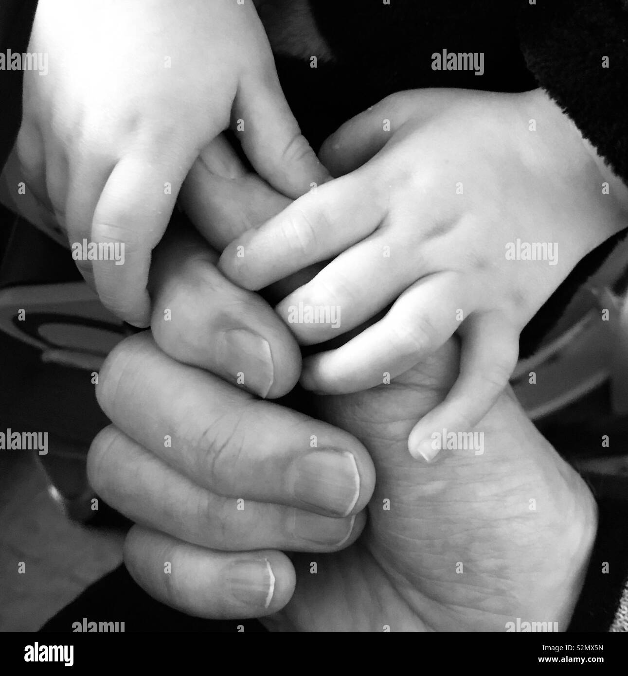 Children care hands hi-res stock photography and images - Alamy
