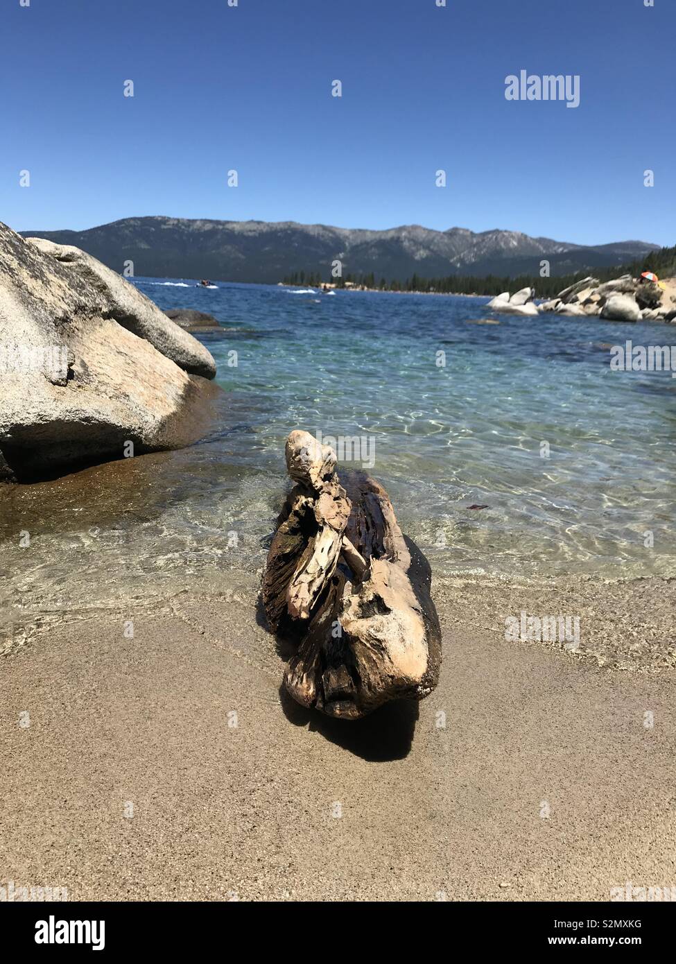 Lake, lakeside, water,rocks,sand, nature Stock Photo - Alamy