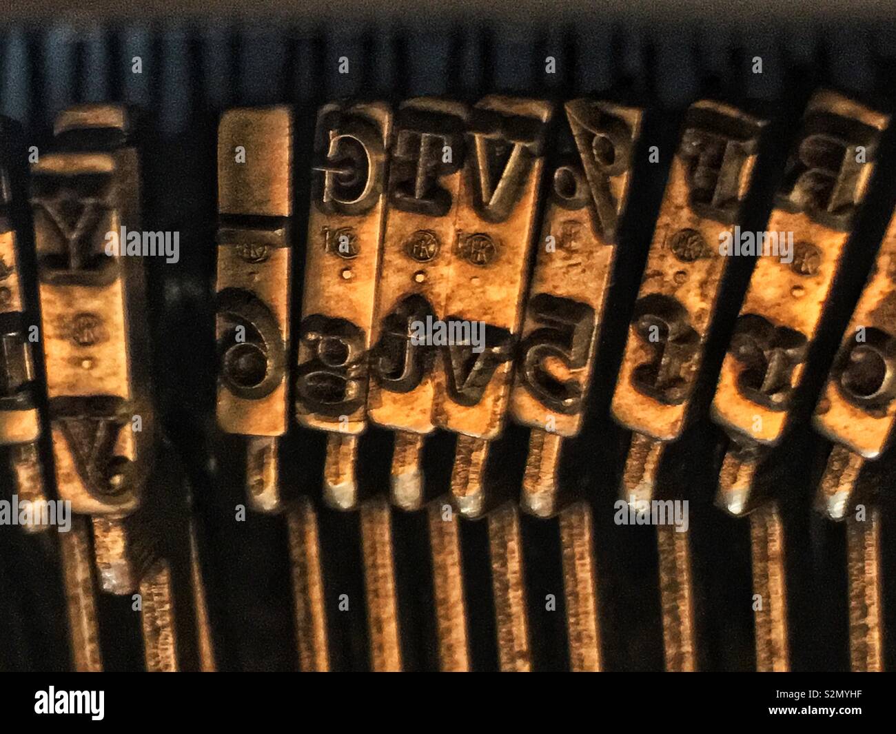 Soft focus Closeup of letter printing keys in an antique typewriter ...