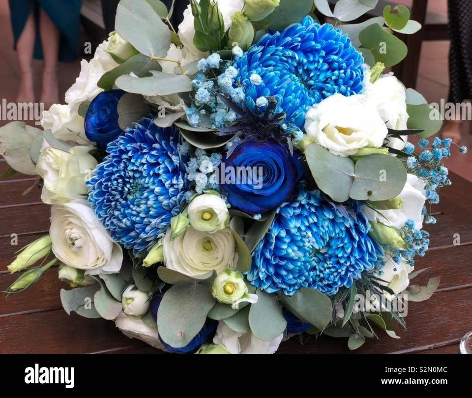 Mixed blue wedding flowers Stock Photo - Alamy