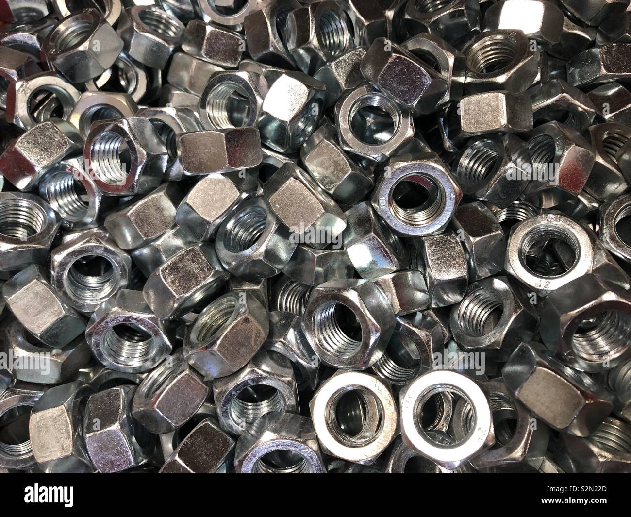 A picture full of shiny Nuts Stock Photo - Alamy