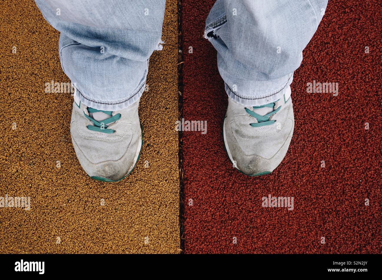 feet on the colorful ground Stock Photo - Alamy