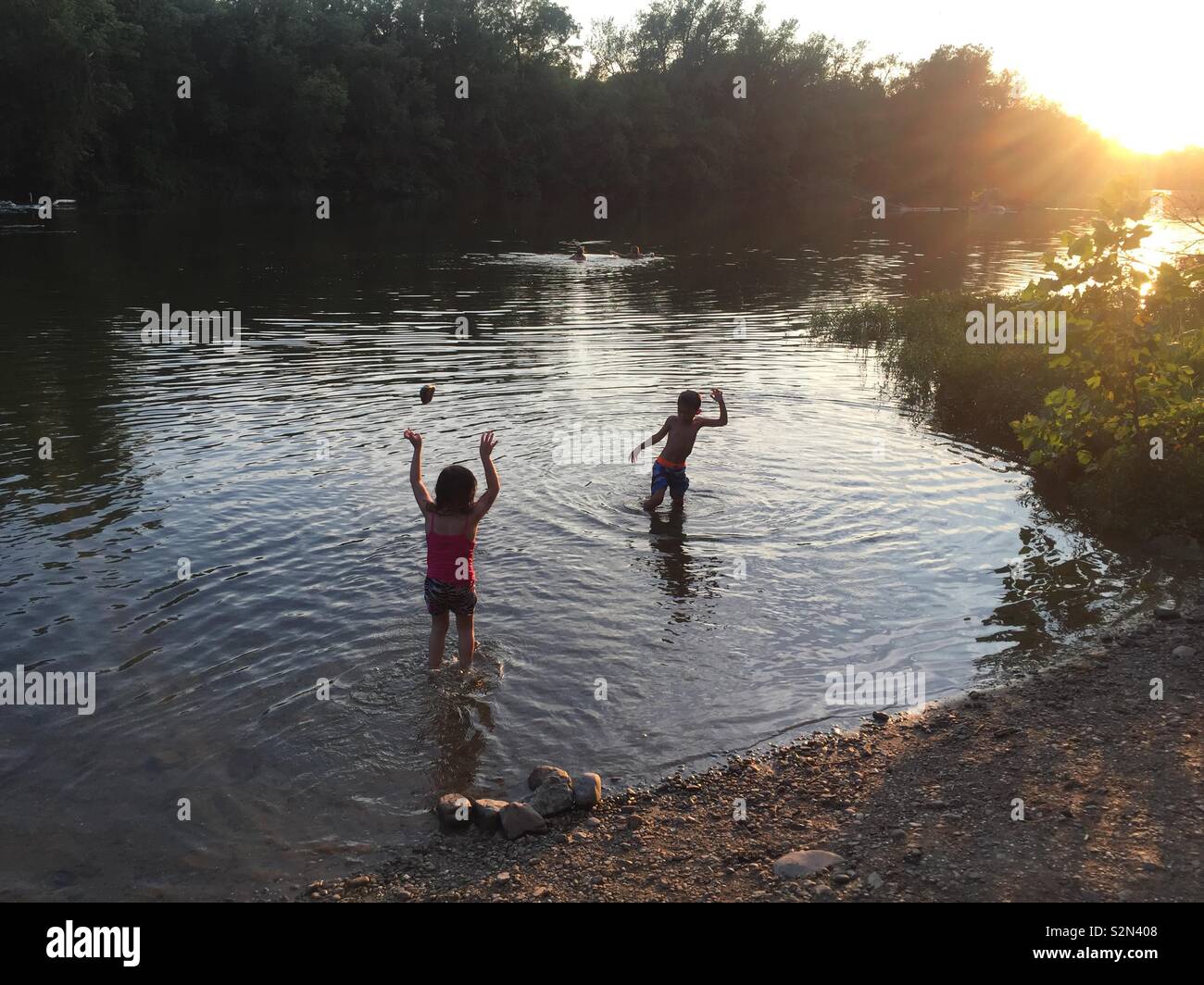 Children playing river hi-res stock photography and images - Alamy