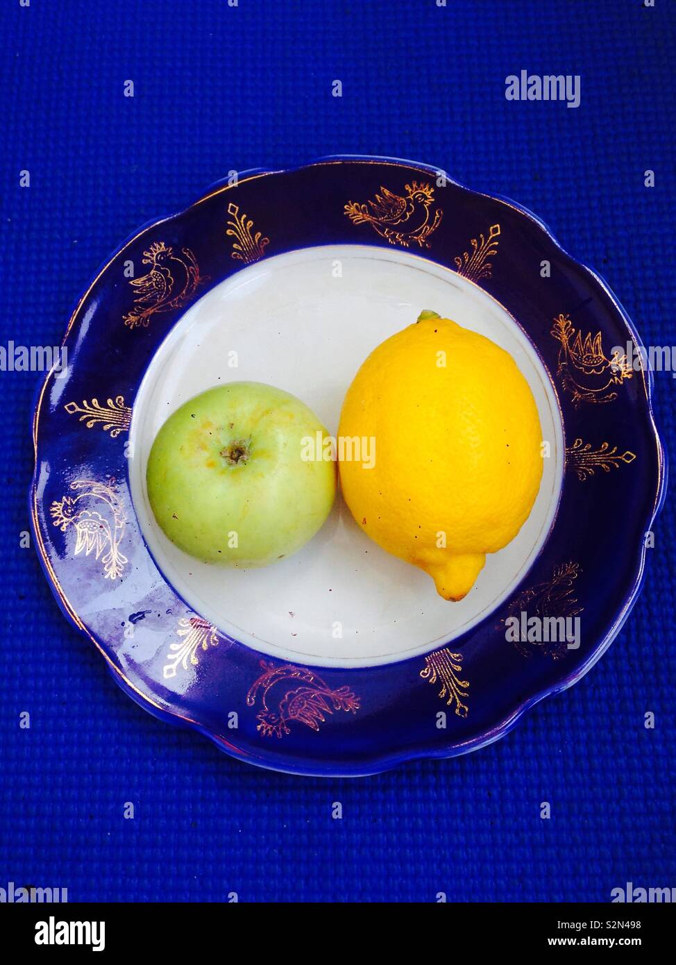 Healthy wealthy fruits on a plate Stock Photo - Alamy