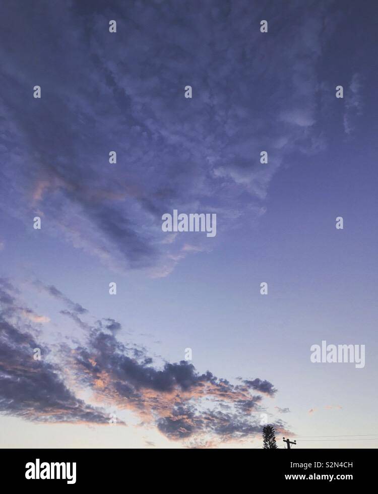 Figure in clouds Stock Photo - Alamy