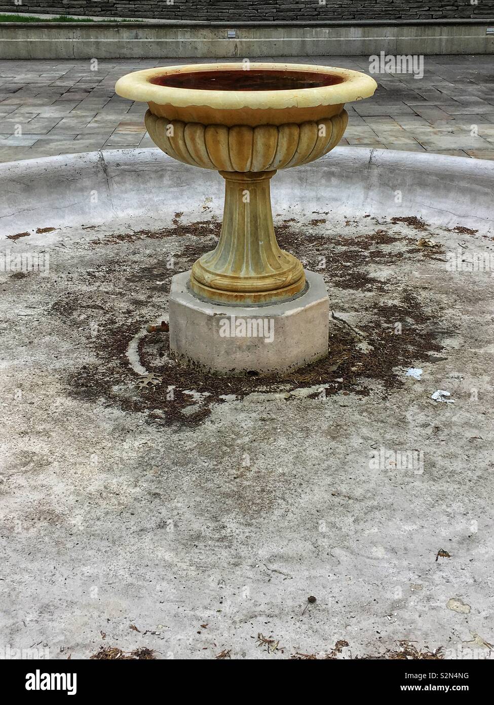 Huge urn standing in the middle of an empty water fountain Stock Photo ...