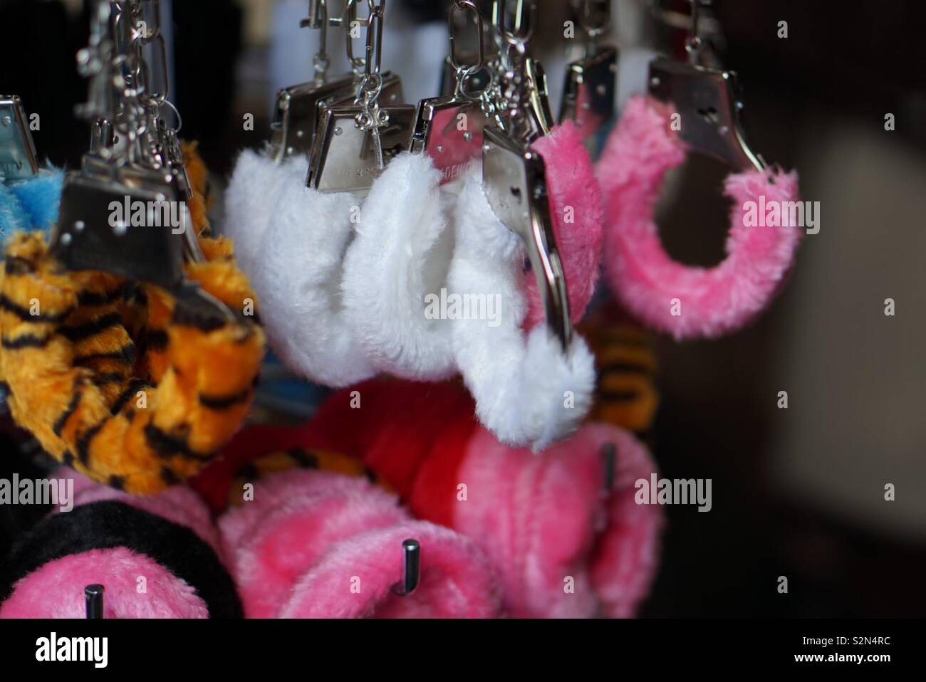 Fluffy handcuffs hi-res stock photography and images - Alamy