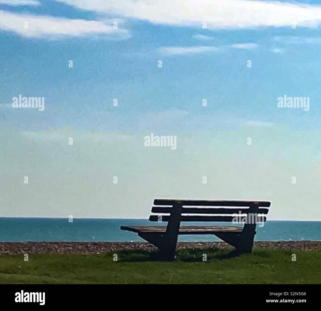 A bench with a view of the sea Stock Photo - Alamy