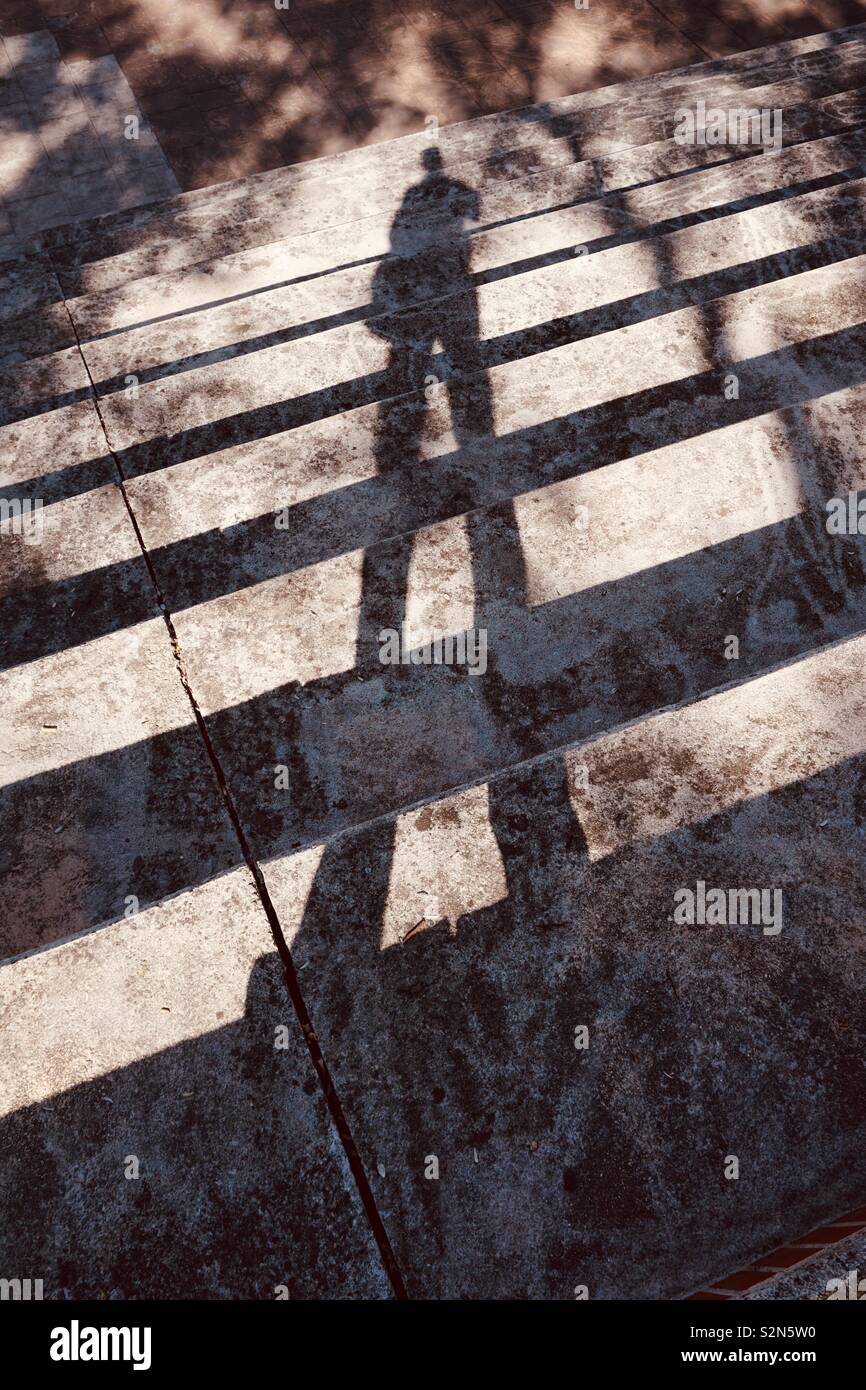 Shadow man stairs hi-res stock photography and images - Alamy