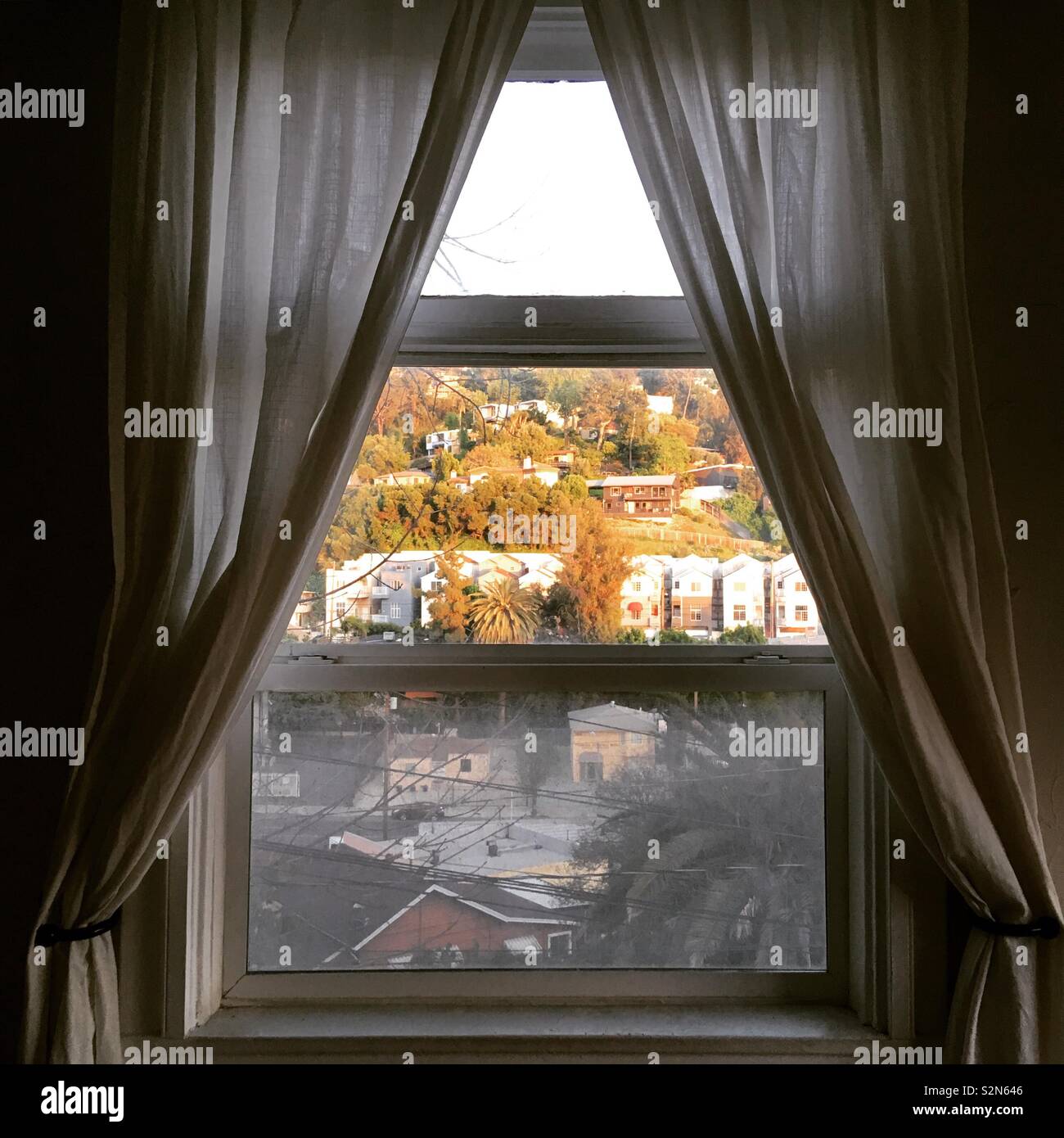 Window view sunset Stock Photo - Alamy