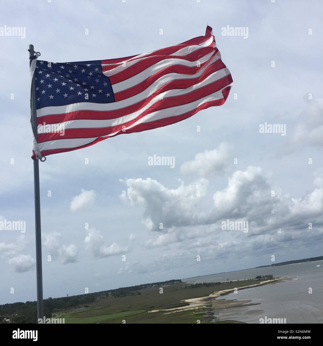 American Flag Above Land Stock Photo - Alamy