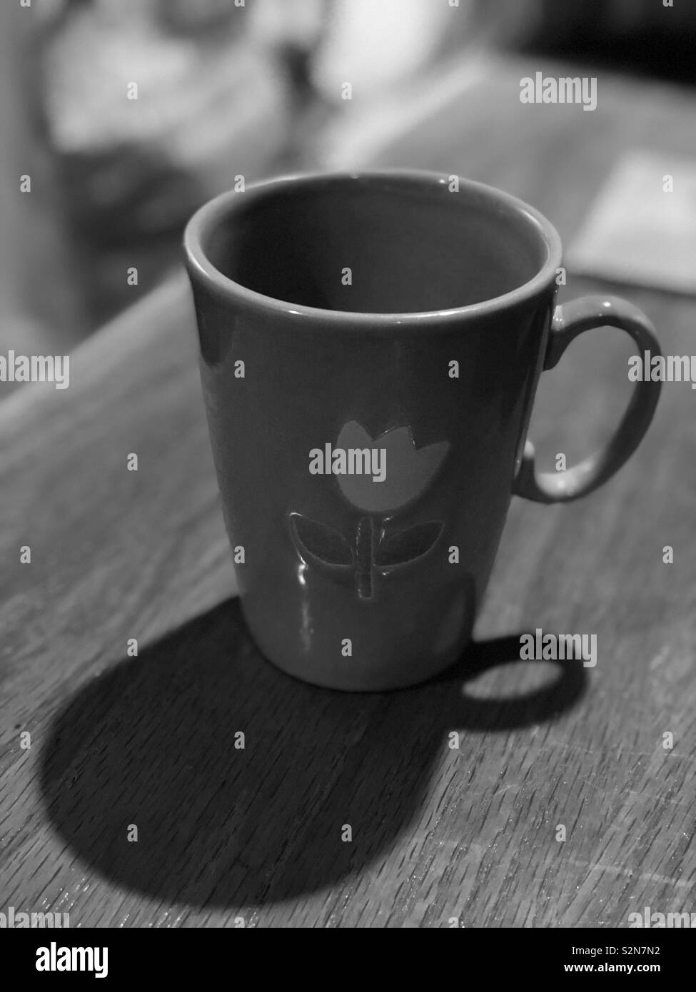 Vintage mug with shadow Stock Photo - Alamy