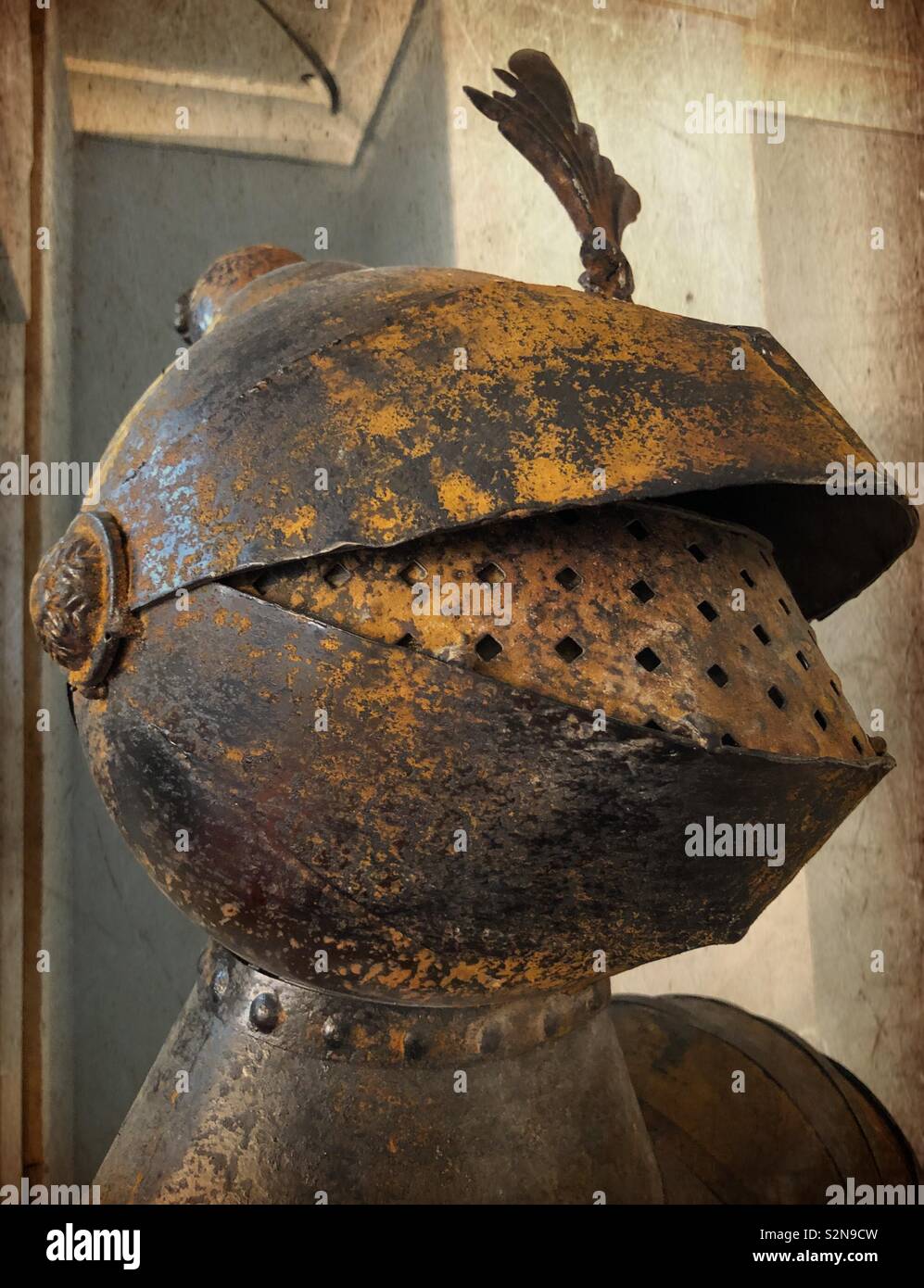 Rusty helmet of a suit of armour Stock Photo - Alamy