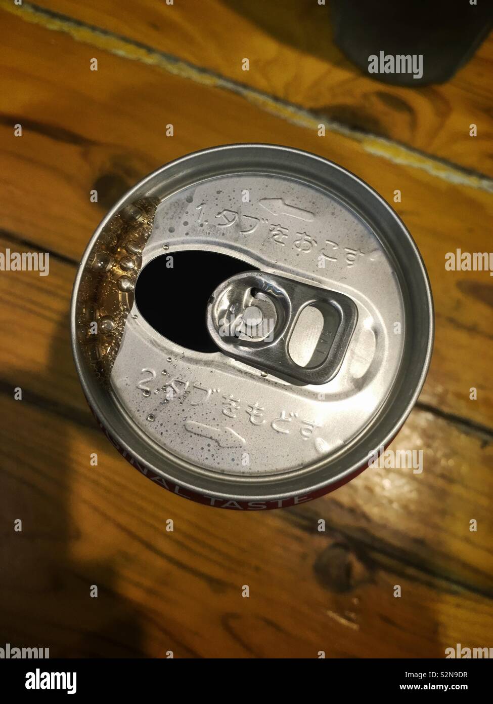 Can of brown soda Stock Photo - Alamy