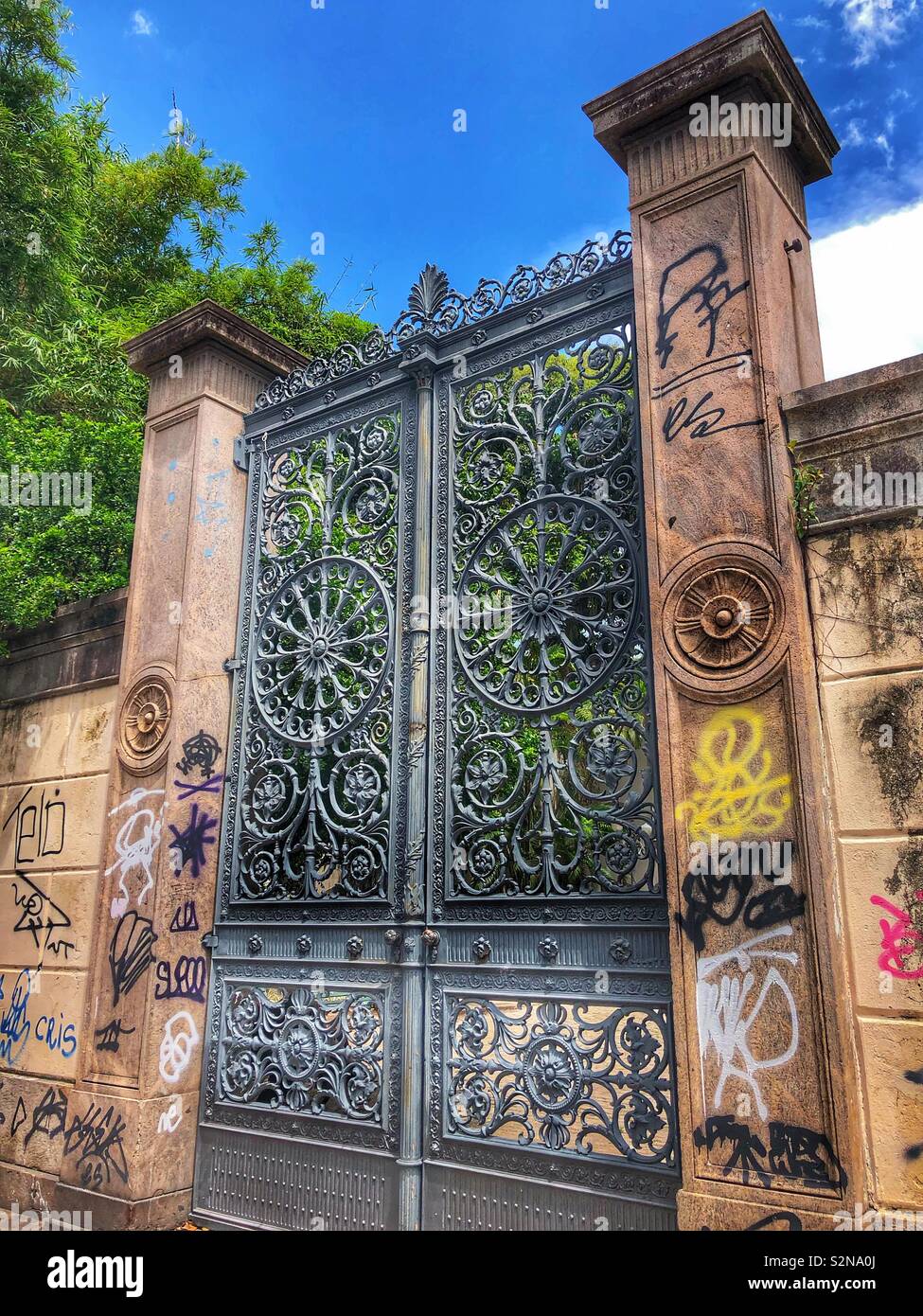 Intricate rod iron gate at a park entrance in Rio de Janeiro, Brazil ...